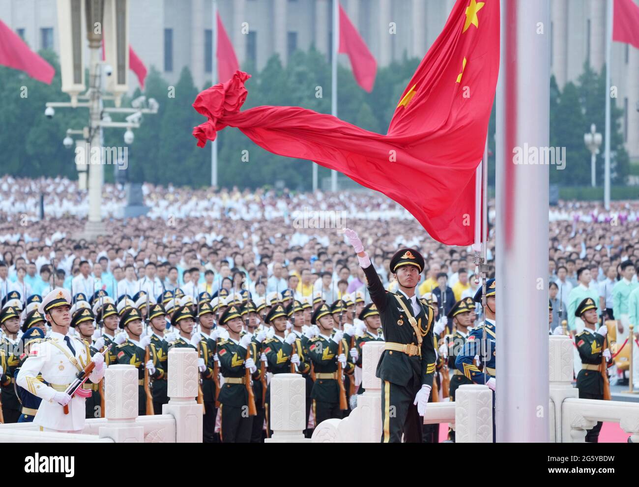 Beijing, China. 1st July, 2021. A national flag-raising ceremony is ...