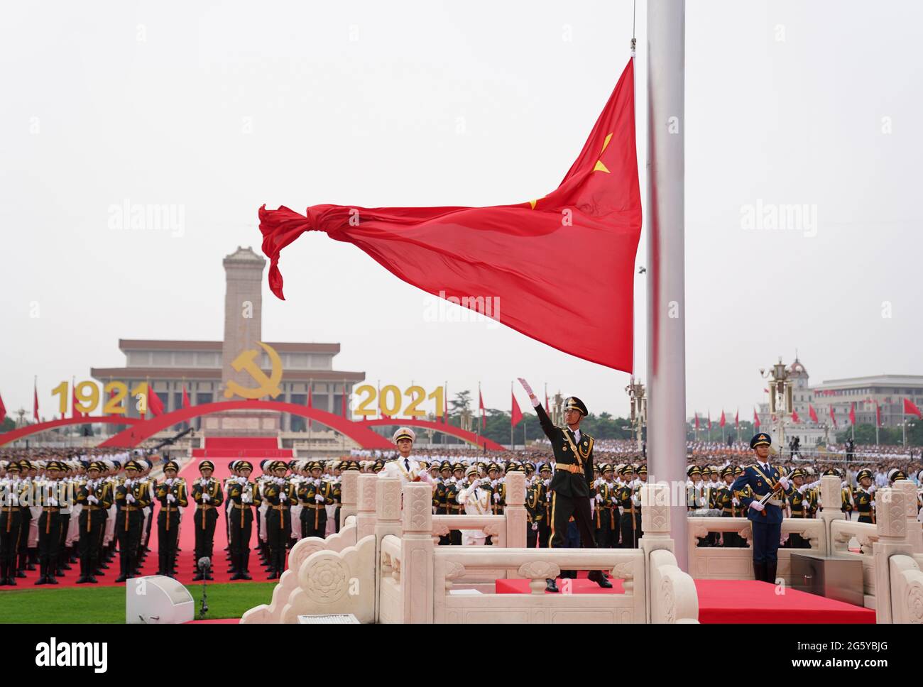 Beijing, China. 1st July, 2021. A national flag-raising ceremony is ...