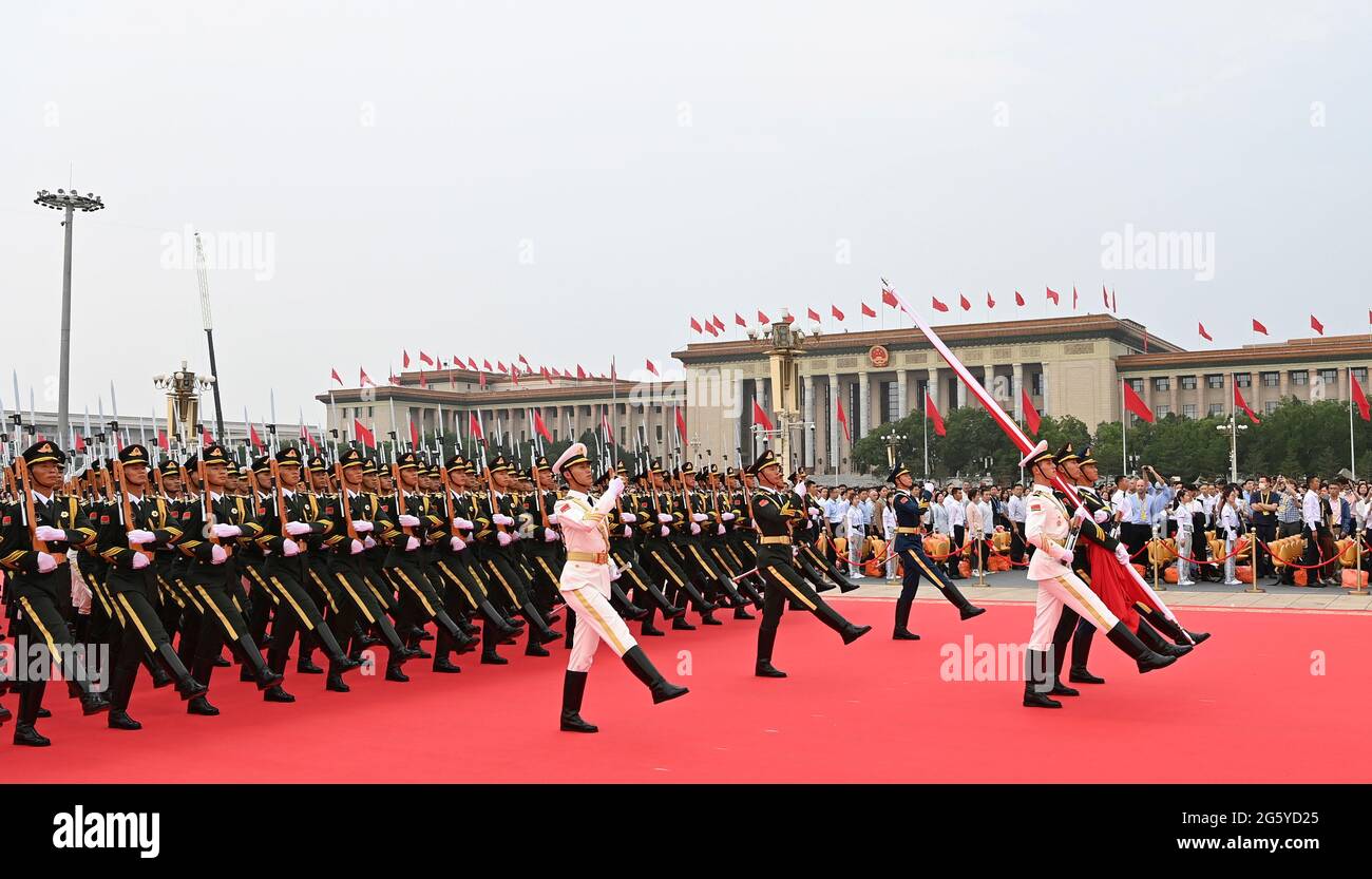 Beijing, China. 1st July, 2021. The national flag guards march during a ...