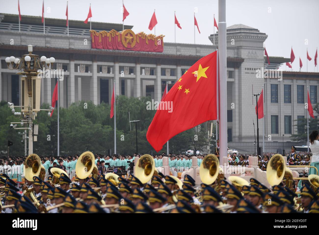 Beijing, China. 1st July, 2021. A national flag-raising ceremony is ...