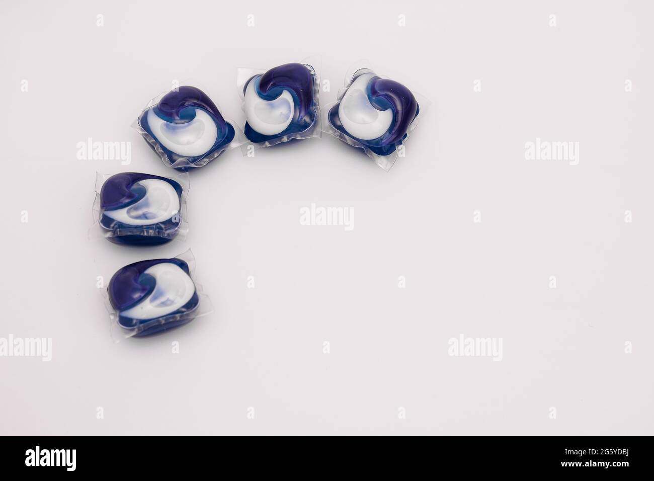 detergents. on a white background. gel capsules of washing powder Stock ...