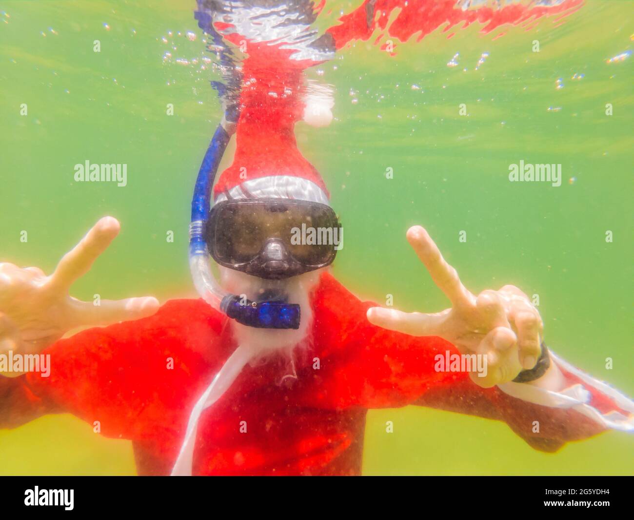 Santa claus is snorkeling underwater - christmas or happy new year ...
