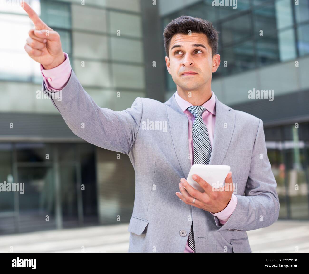 Manager giving instructions Stock Photo - Alamy