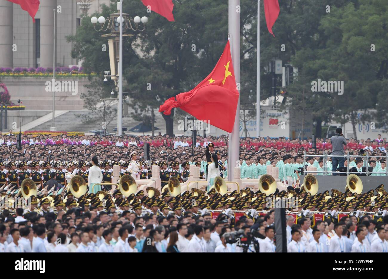 Beijing, China. 1st July, 2021. A national flag-raising ceremony is ...