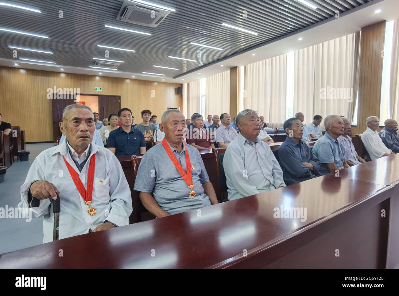 SIHONG, CHINA - JULY 1, 2021 - Party members watch a grand gathering ...