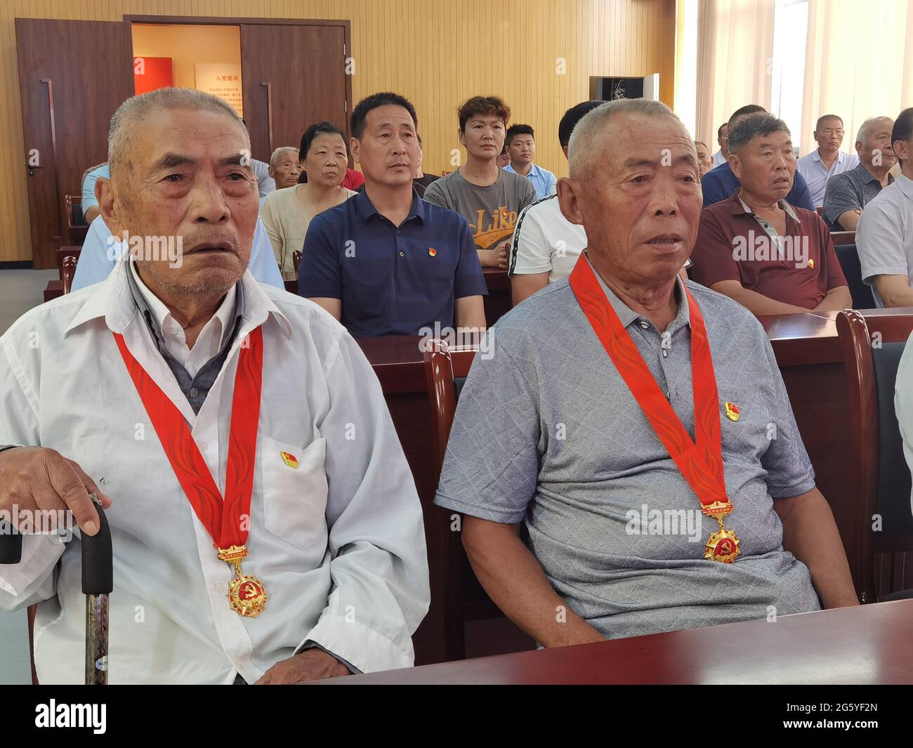 SIHONG, CHINA - JULY 1, 2021 - Party members watch a grand gathering ...