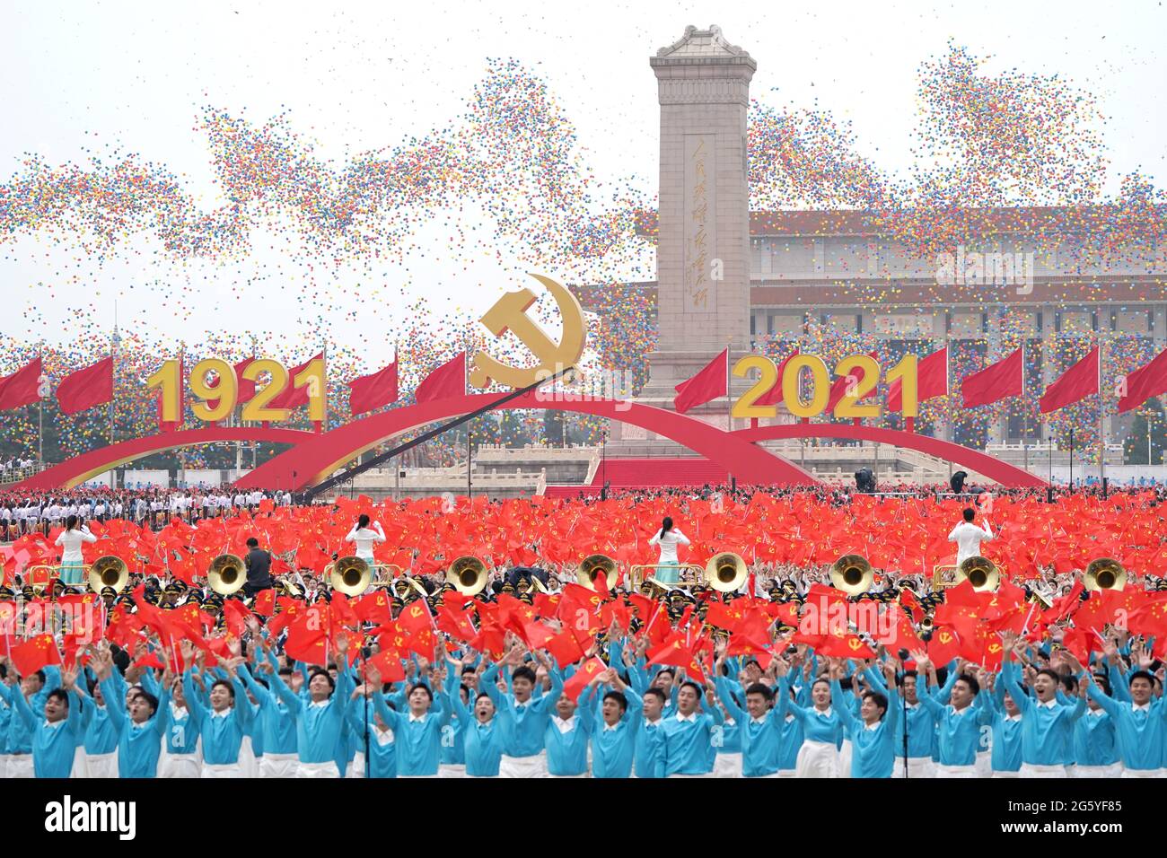 Beijing, China. 1st July, 2021. Balloons are released during a ceremony ...