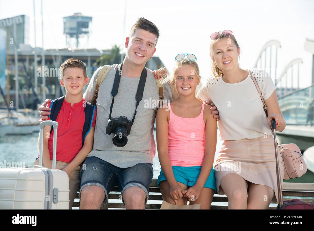 Young parents with kids travelling together Stock Photo - Alamy