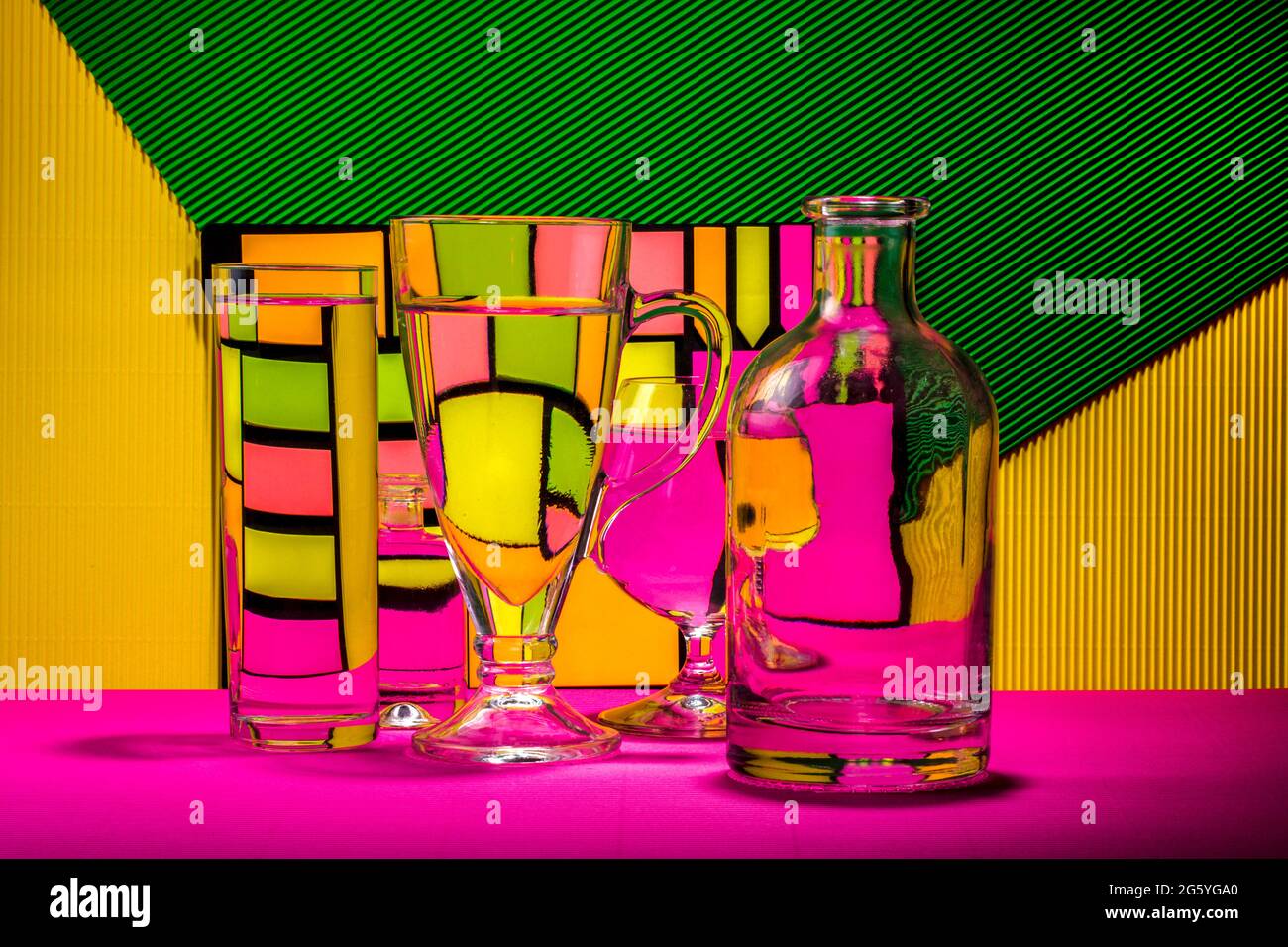 Abstract still life with glassware on colored bright background Stock ...