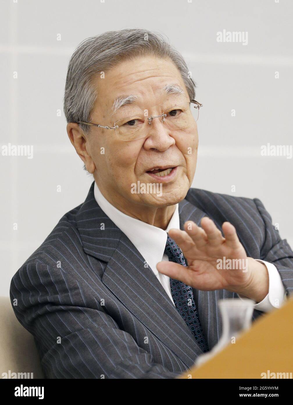 File photo shows Hiroaki Nakanishi giving an interview in Tokyo in May ...