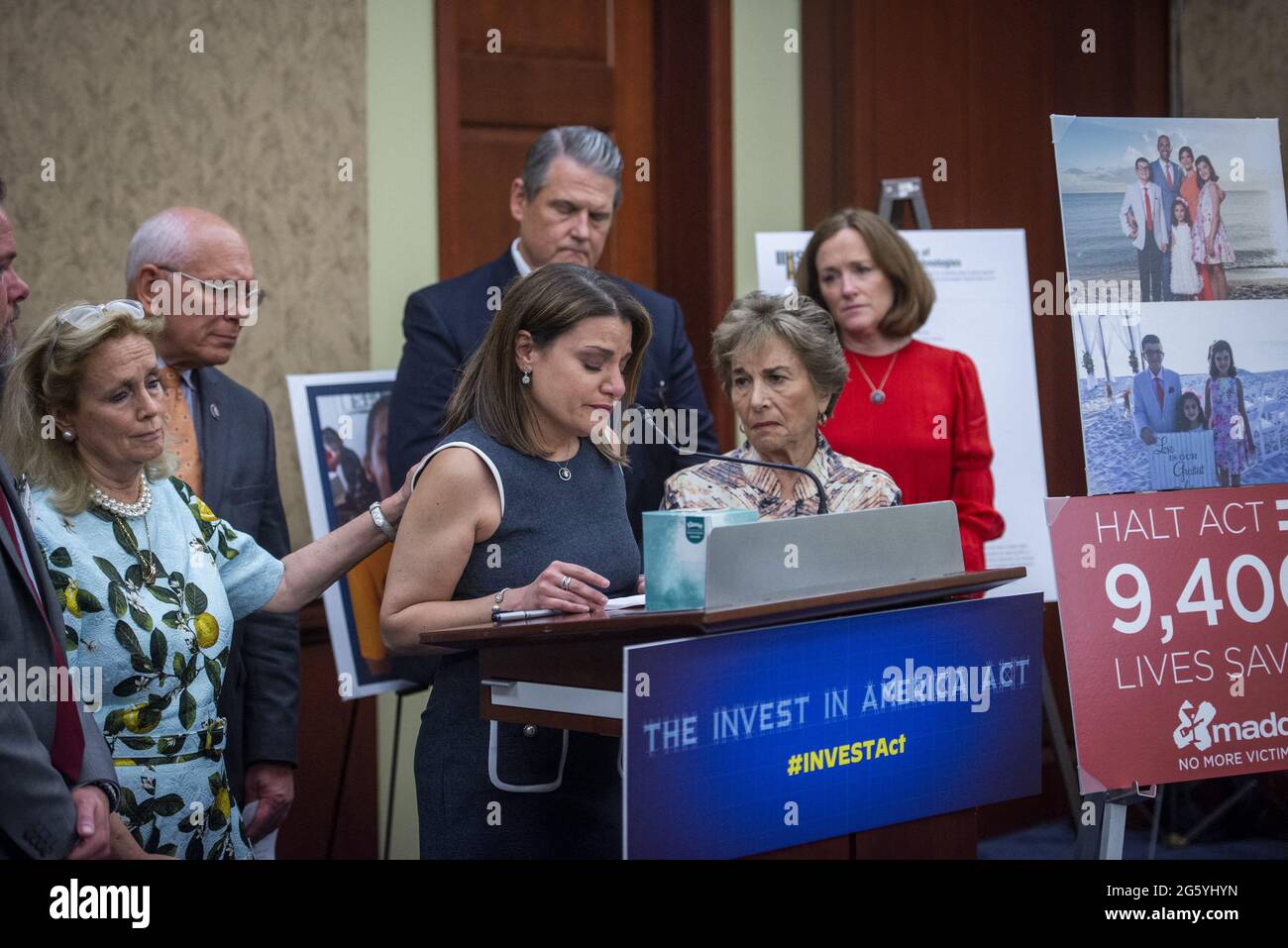 Rana Abbas Taylor, center, is comforted by United States Representative ...