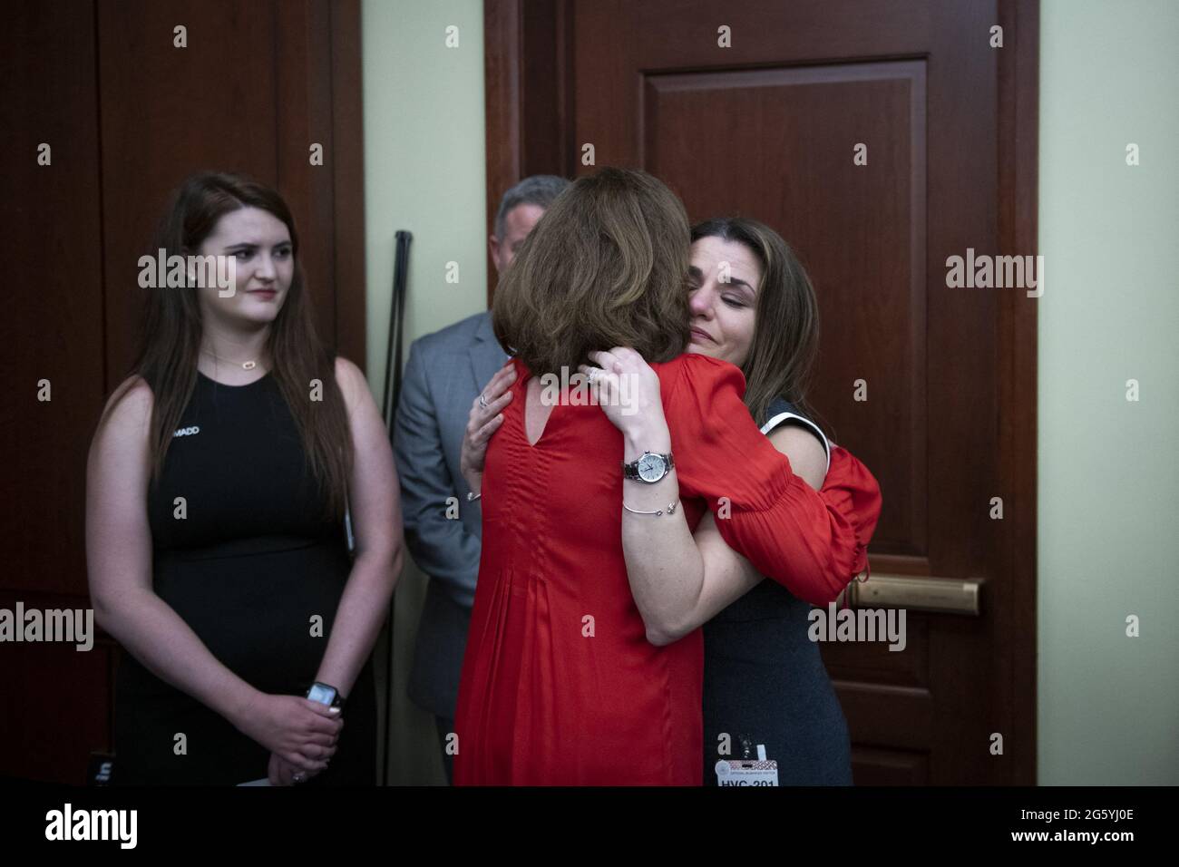 Rana Abbas Taylor, right, is comforted by United States Representative ...
