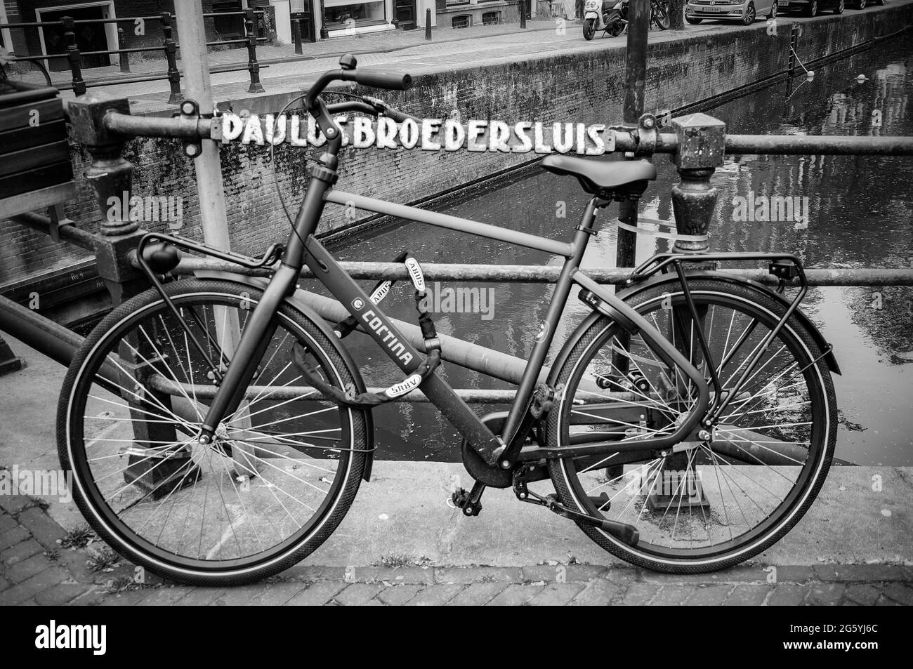 Man on traditional dutch bicycle Black and White Stock Photos & Images ...
