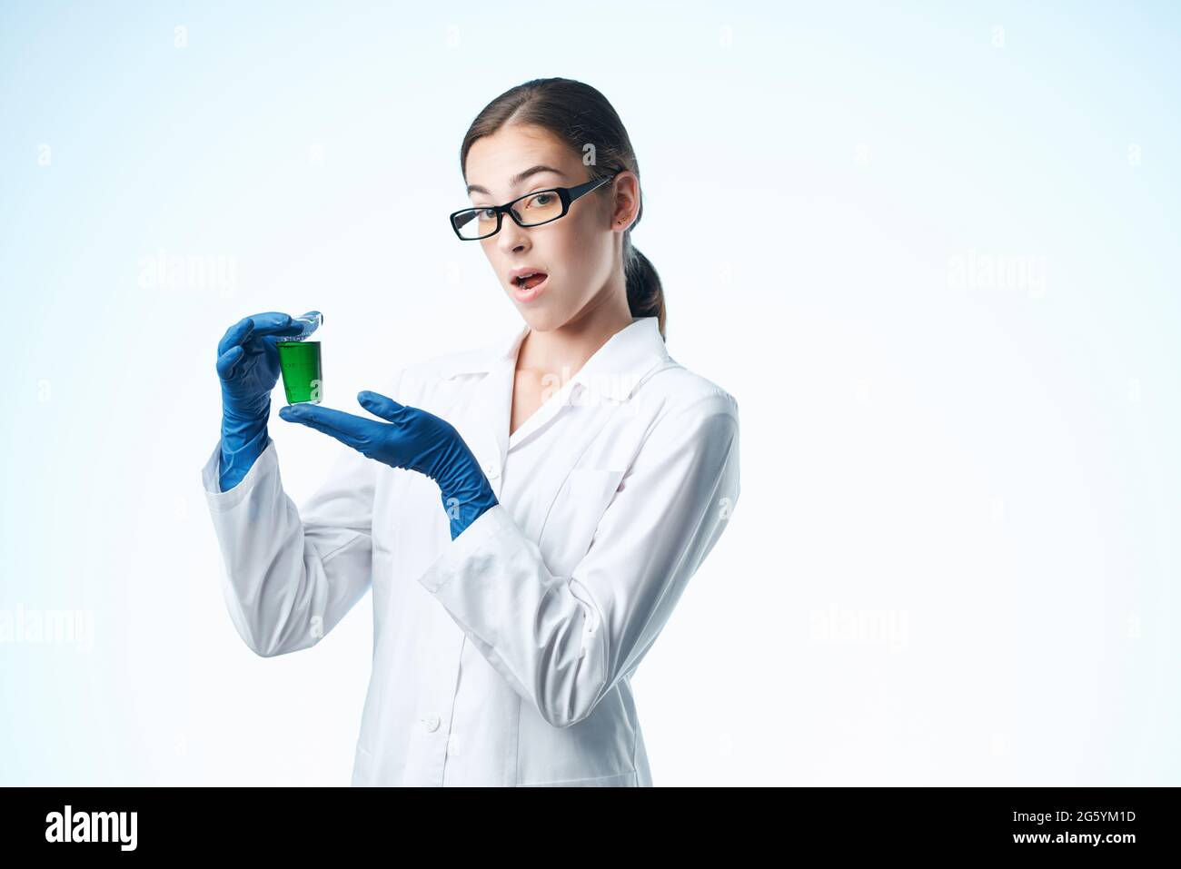 female laboratory assistant professional chemistry analyzes in ...