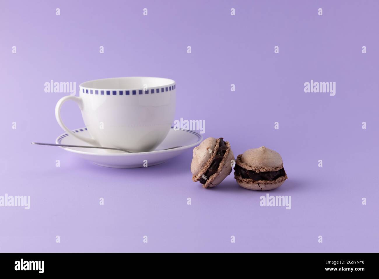 macaron and tea for morning break Stock Photo - Alamy