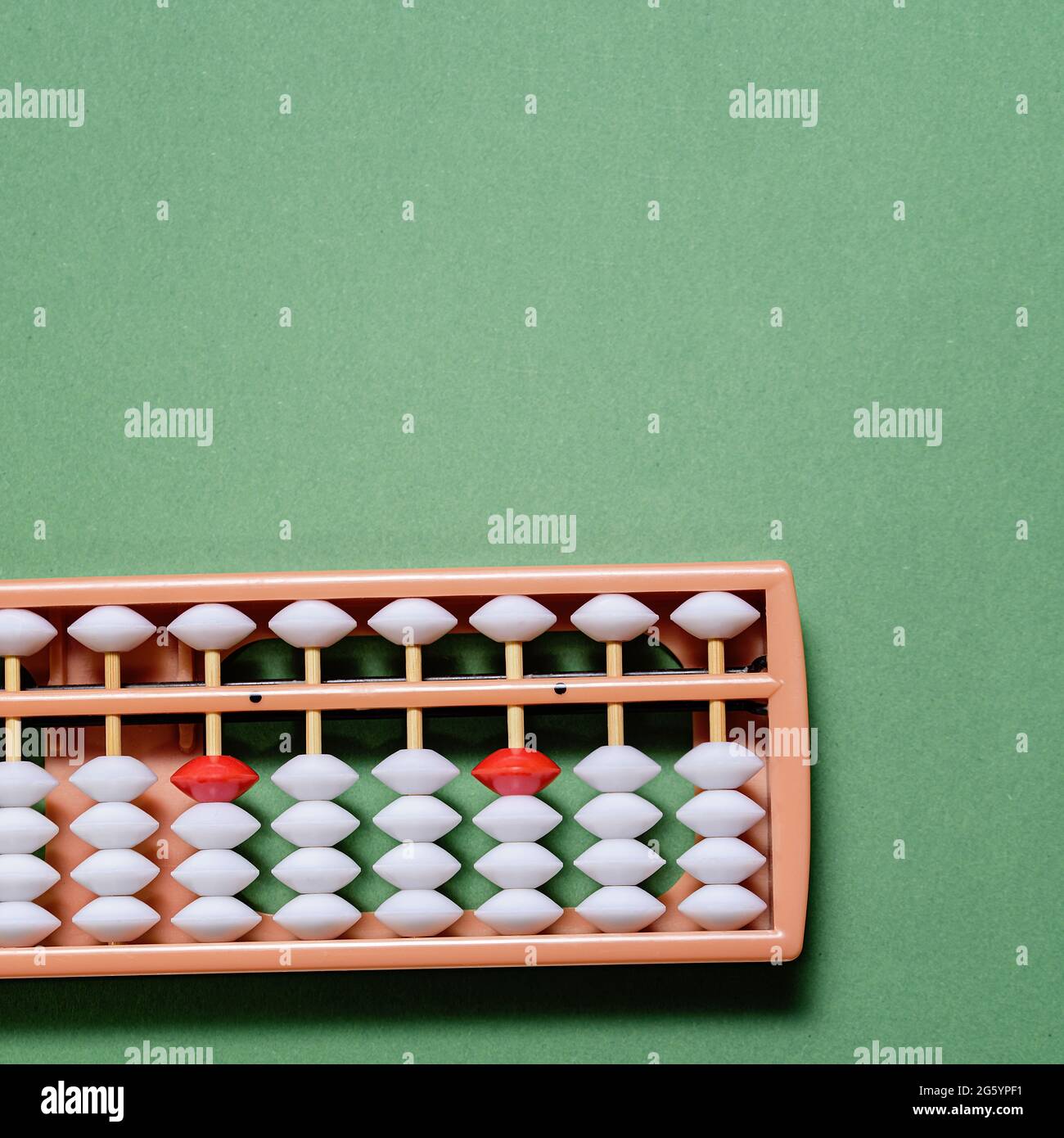 Japanese traditional abacus soroban on green background. Education and ...