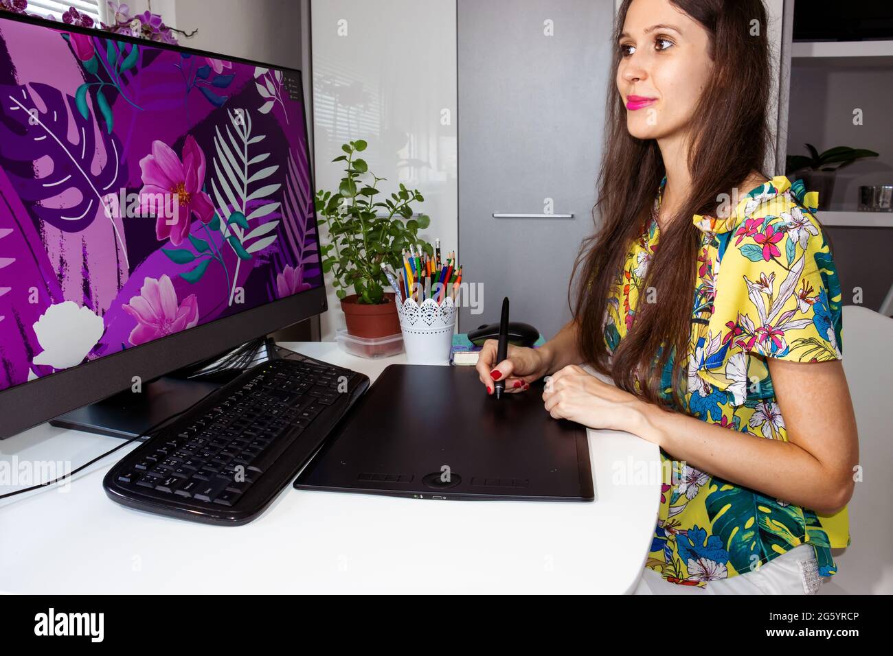 A Smiling Woman, Graphic Designer, Illustrator, Fashion Designer is ...