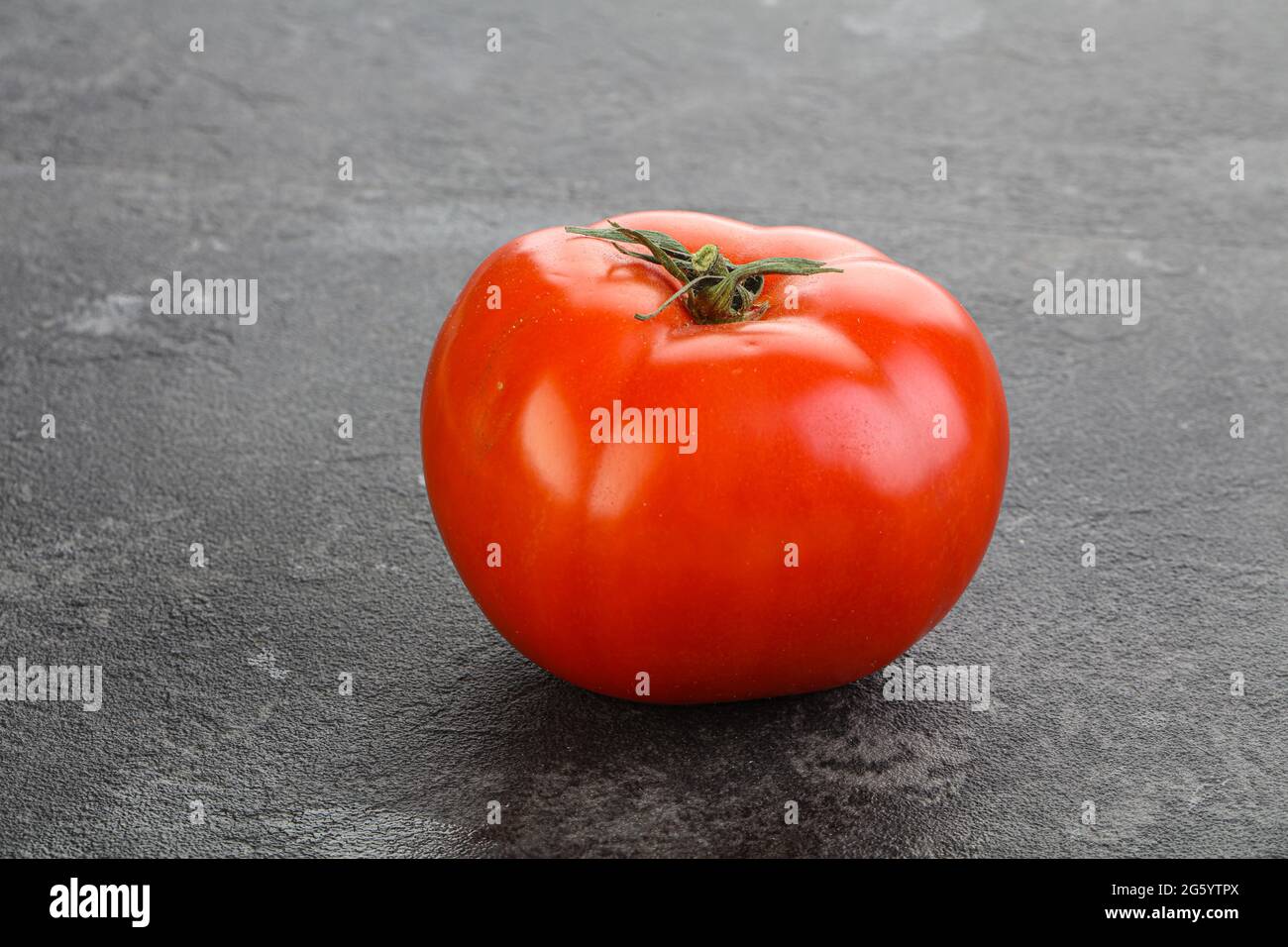 Red ripe big juicy tomato isolated Stock Photo - Alamy