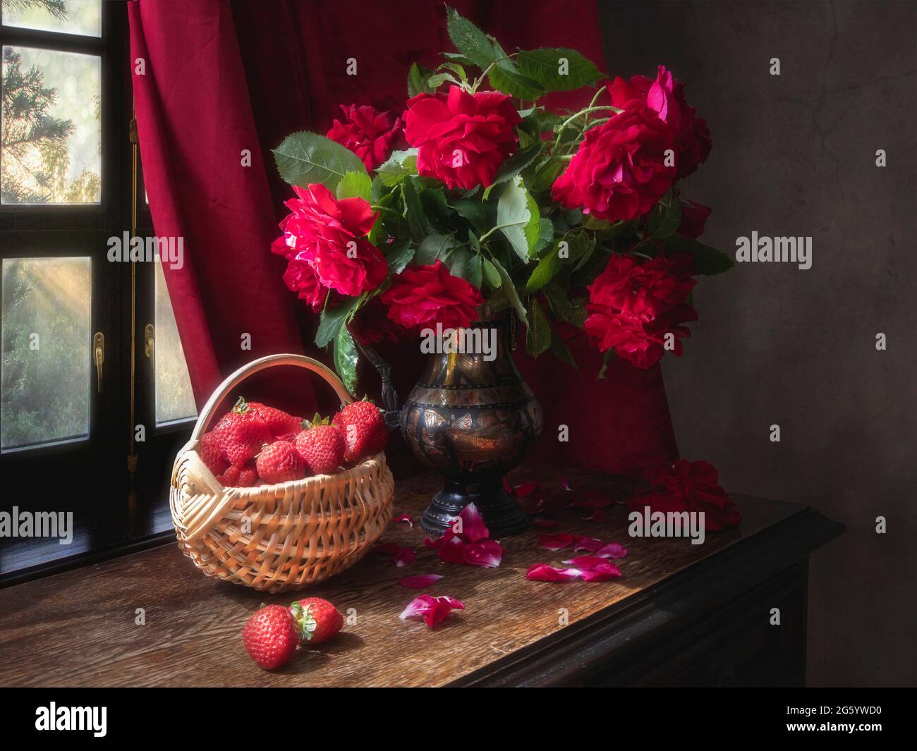 Still life with strawberry and roses Stock Photo - Alamy