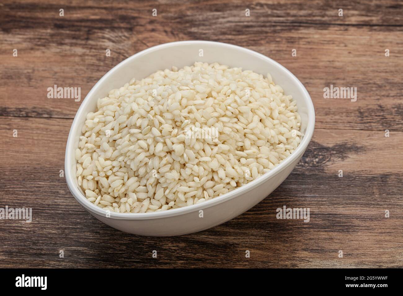 Raw Italian arborio rice for Risotto Stock Photo - Alamy