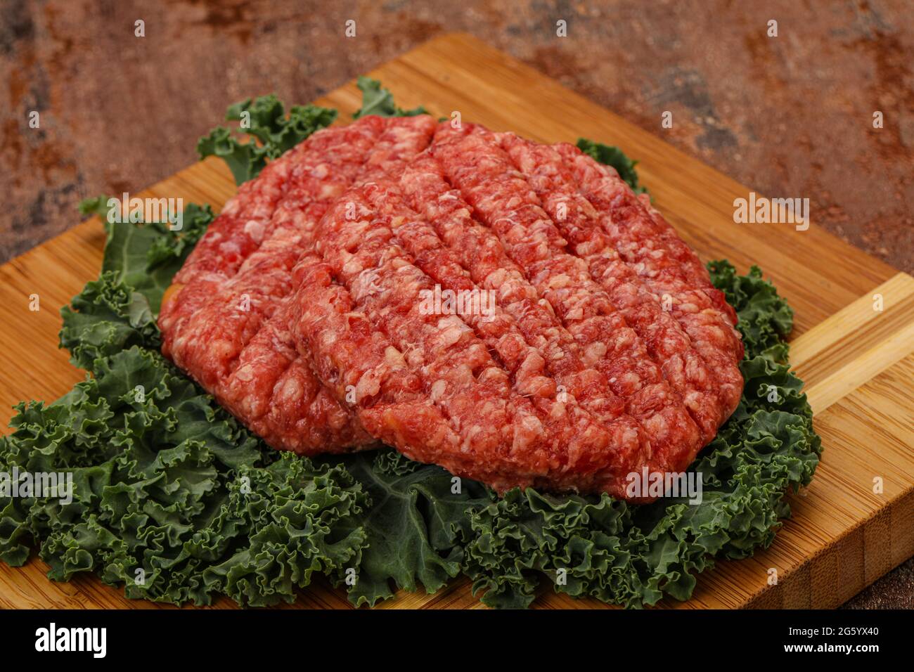 Raw beef burger cutlet for grill Stock Photo - Alamy