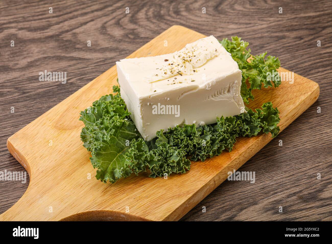 Traditional tasty Greek Feta soft cheese brick Stock Photo - Alamy