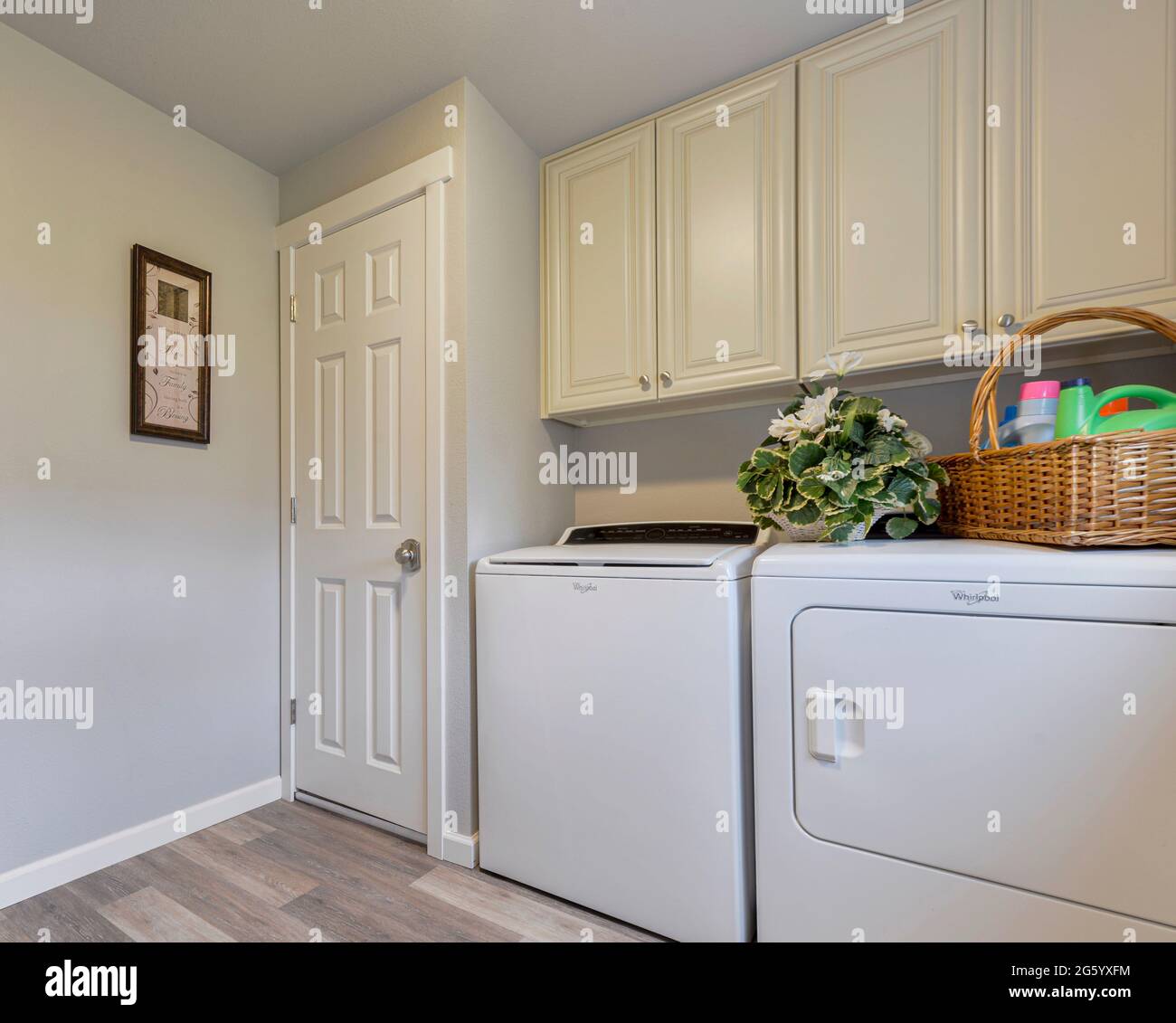 Modern residential laundry room interior Stock Photo - Alamy