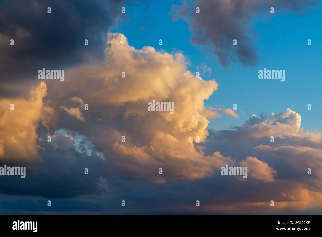 Beautiful sunset evening orange, yellow and dark murky clouds.Sunset ...