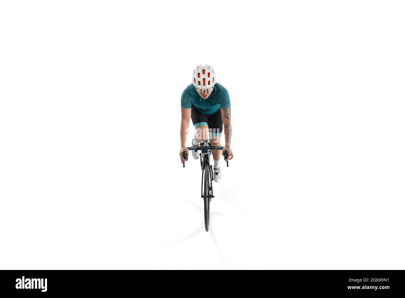 Young professional female bike rider on road bike isolated over white ...