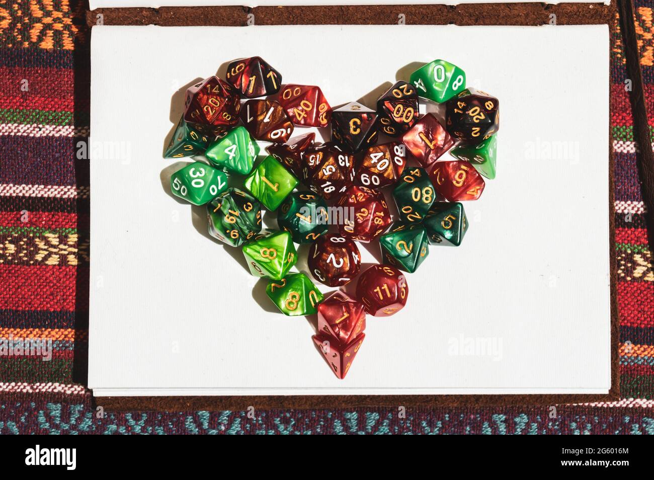Overhead image of a heart symbol created with green and red Role ...