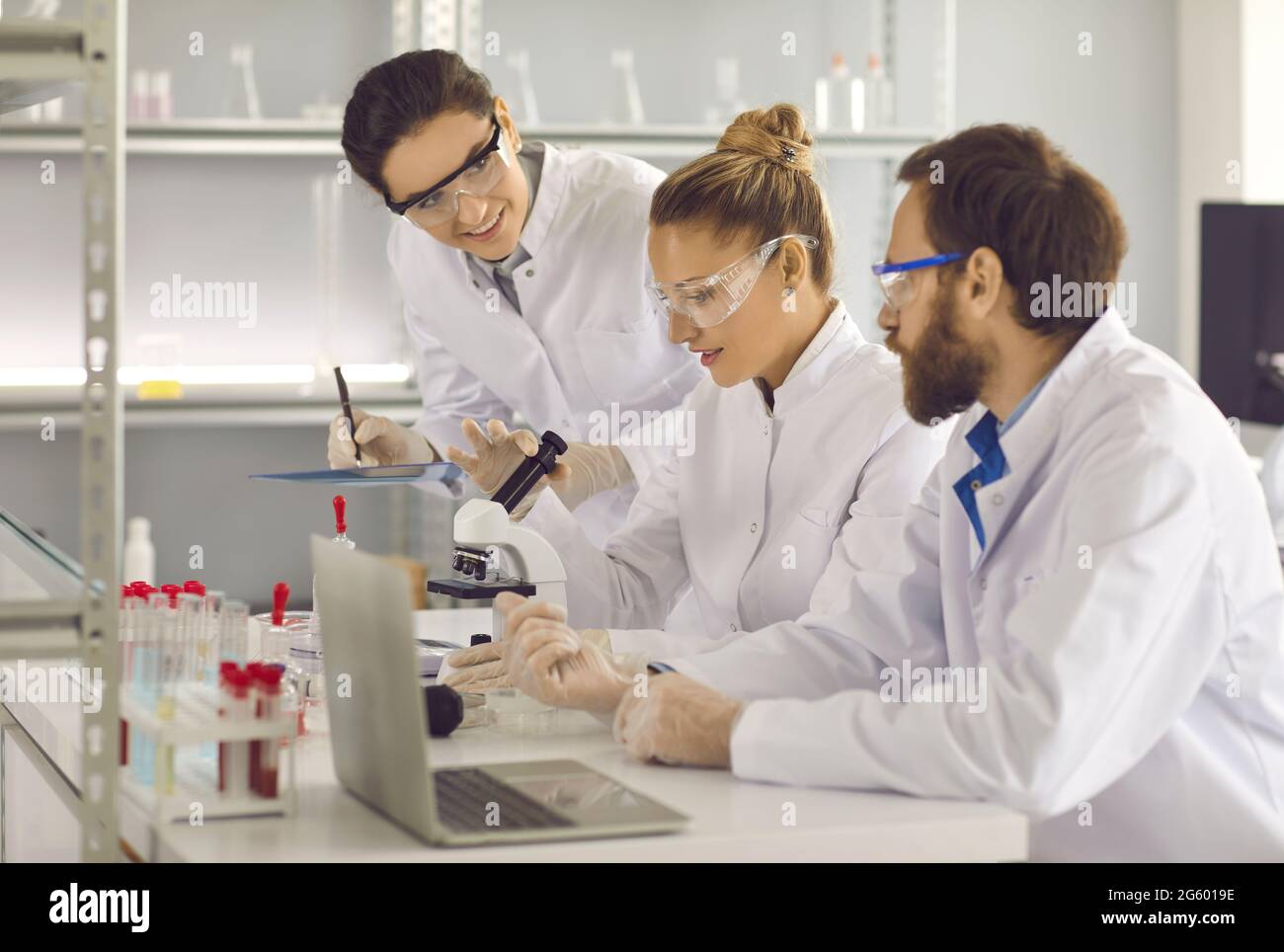 Scientists talk hi-res stock photography and images - Alamy