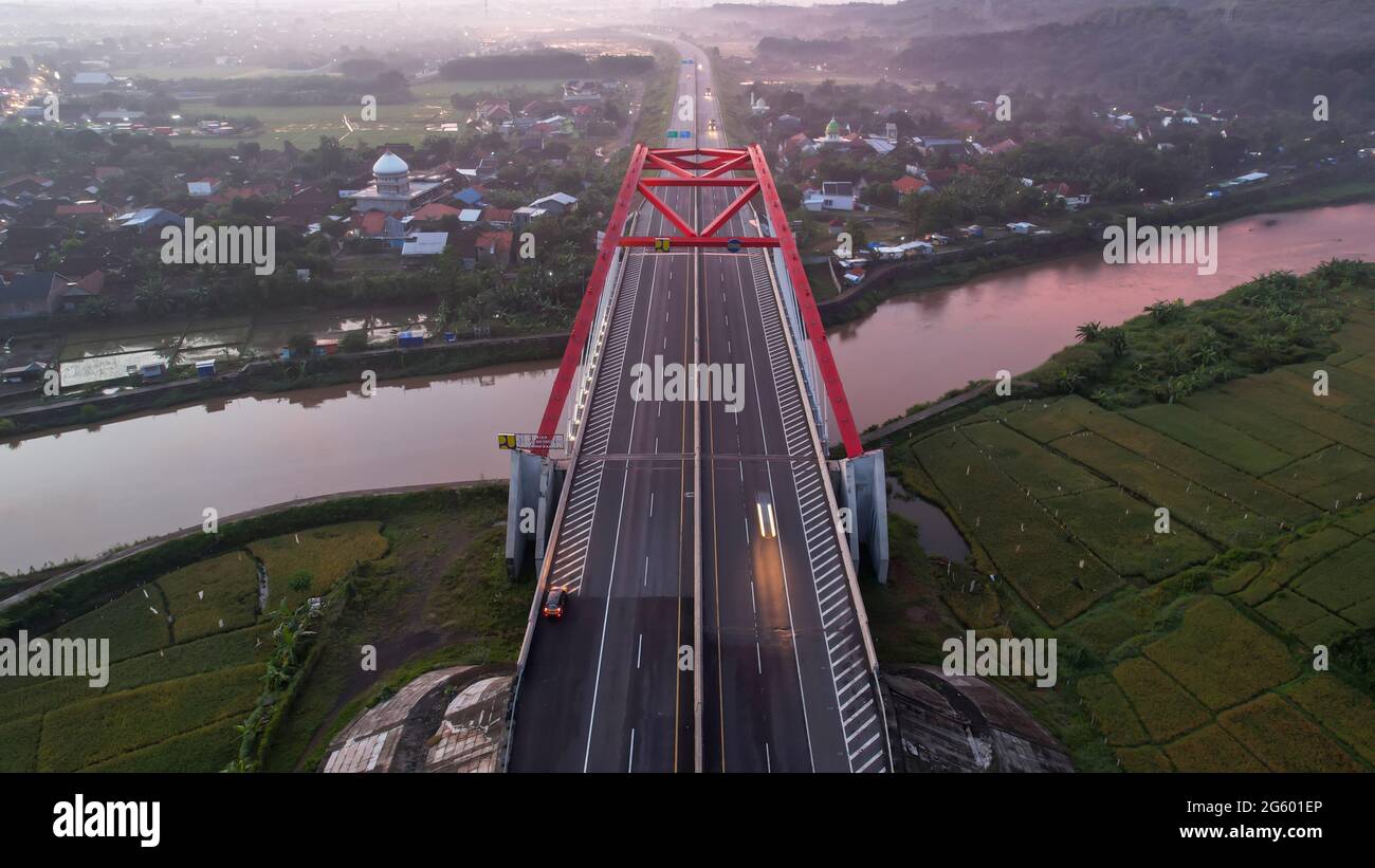 Aerial view of the Kalikuto Bridge, an Iconic Red Bridge at Trans Java ...