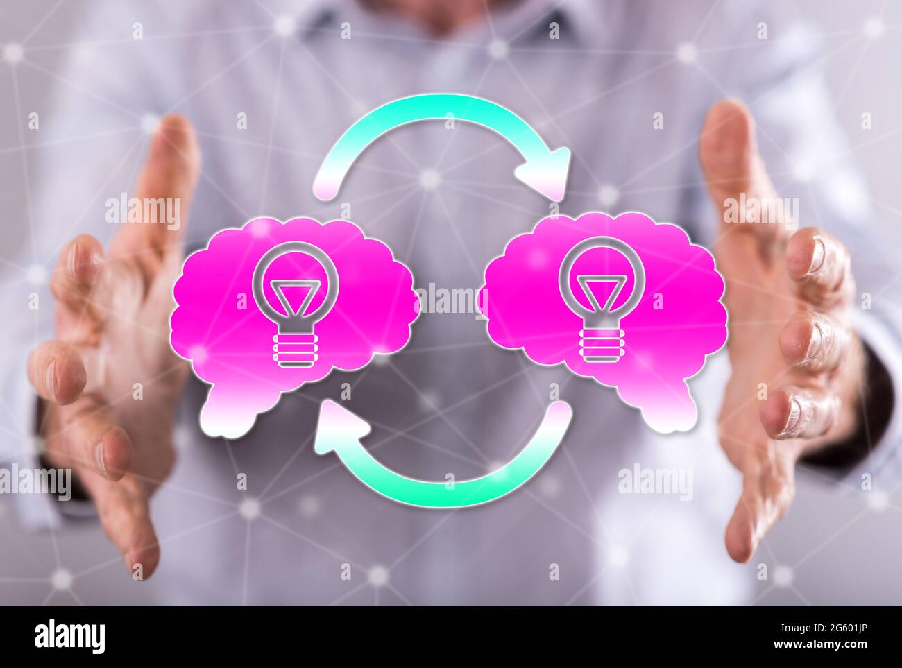 Knowledge sharing concept between hands of a man in background Stock ...