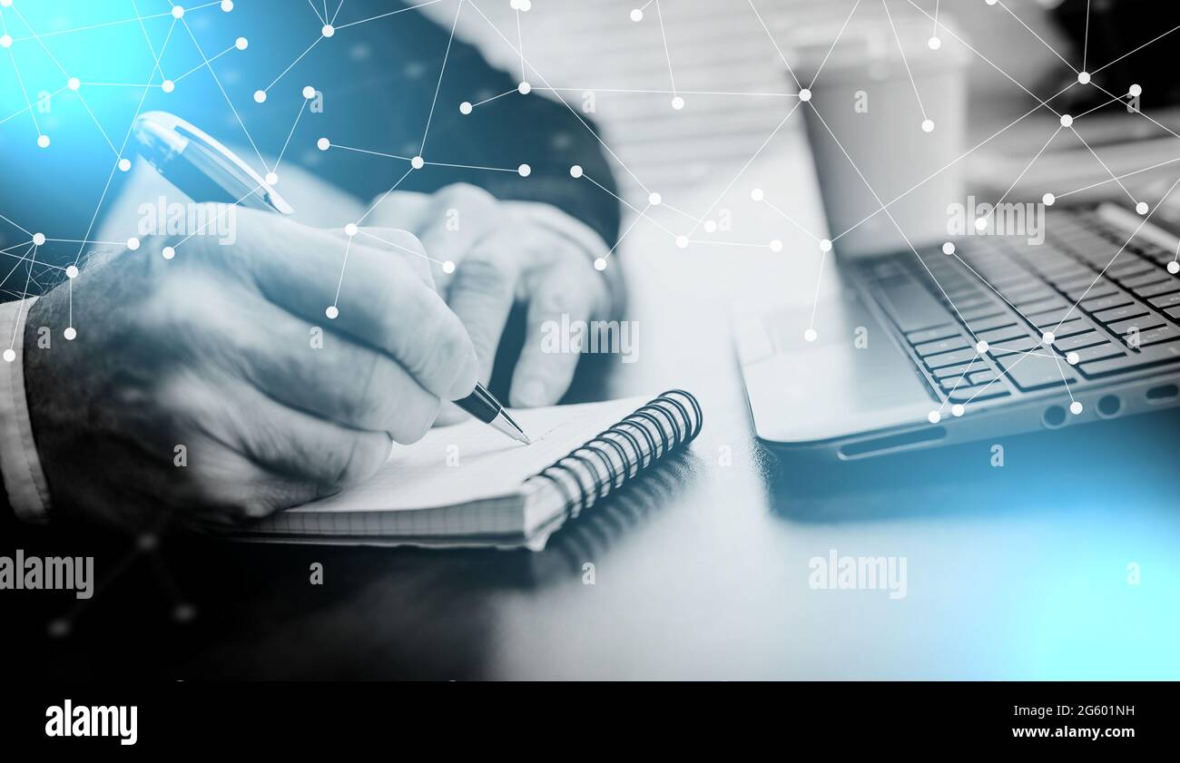 Male hands taking notes on notebook; light effect Stock Photo - Alamy