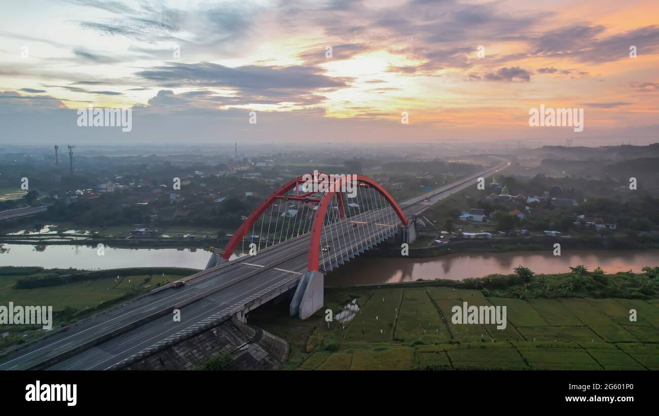 Aerial view of the Kalikuto Bridge, an Iconic Red Bridge at Trans Java ...