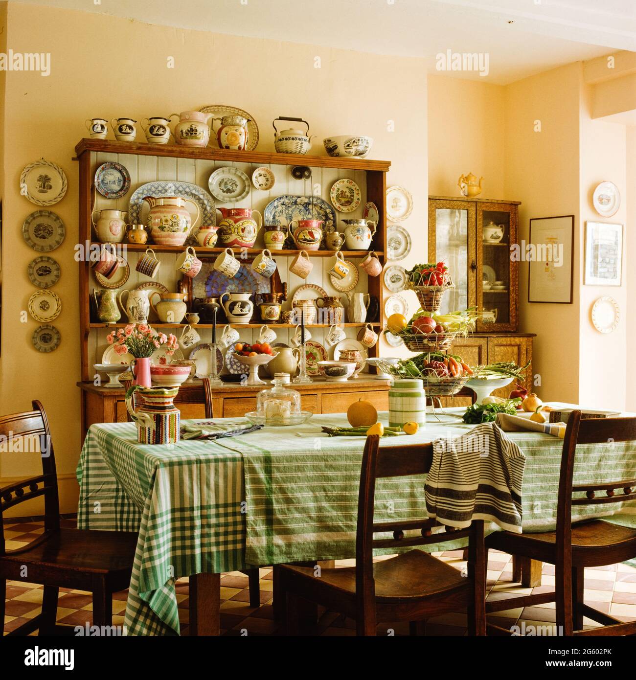 Country style dining room with shelves of tableware Stock Photo - Alamy