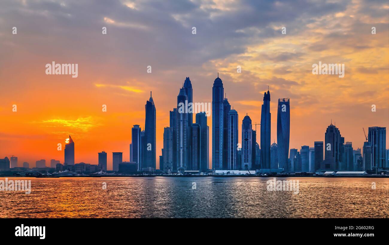 Beautiful panoramic skyline of Dubai, United Arab Emirates at sunset ...