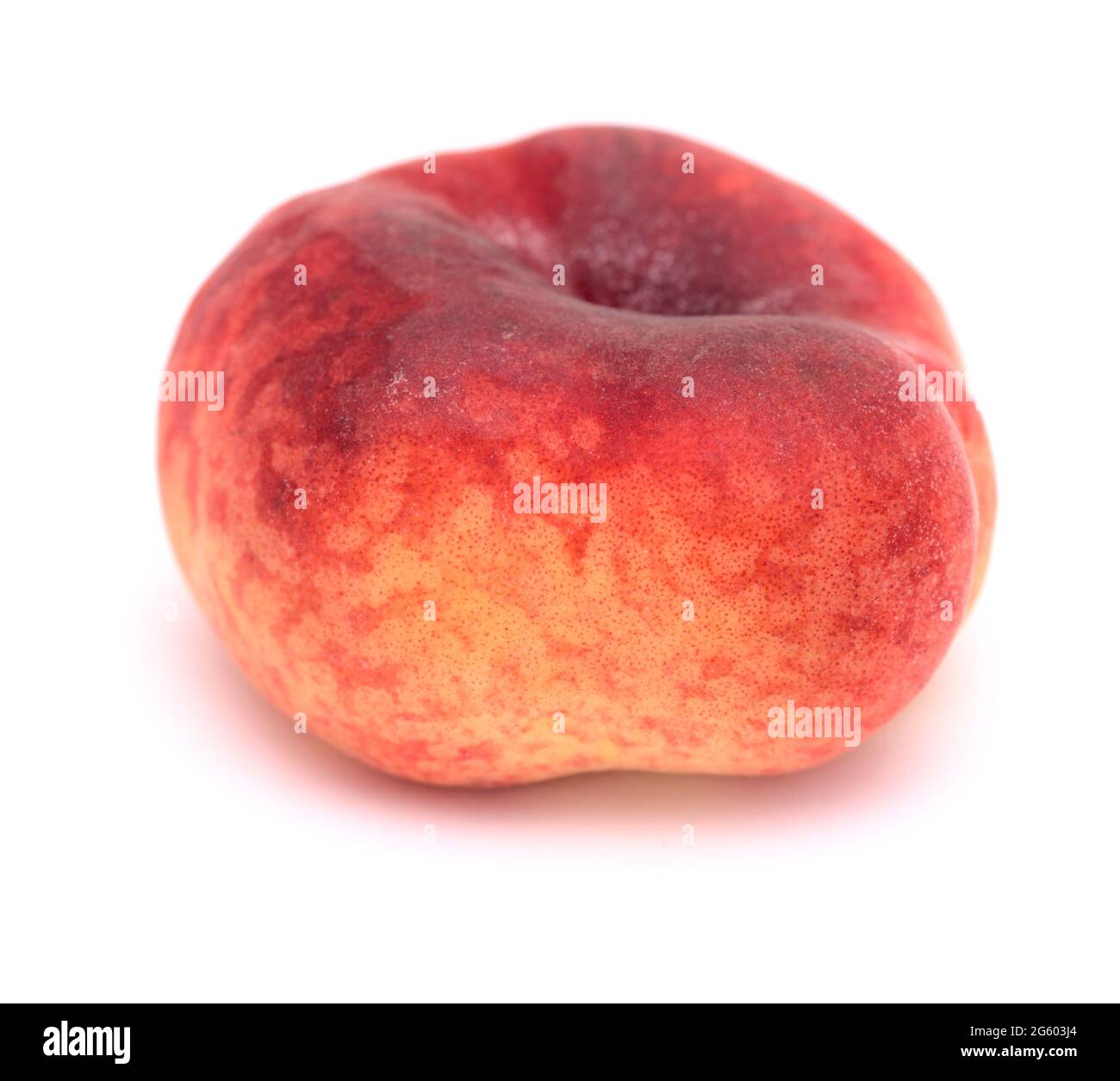 Large yellow and red flat peach fruit isolated on white background ...