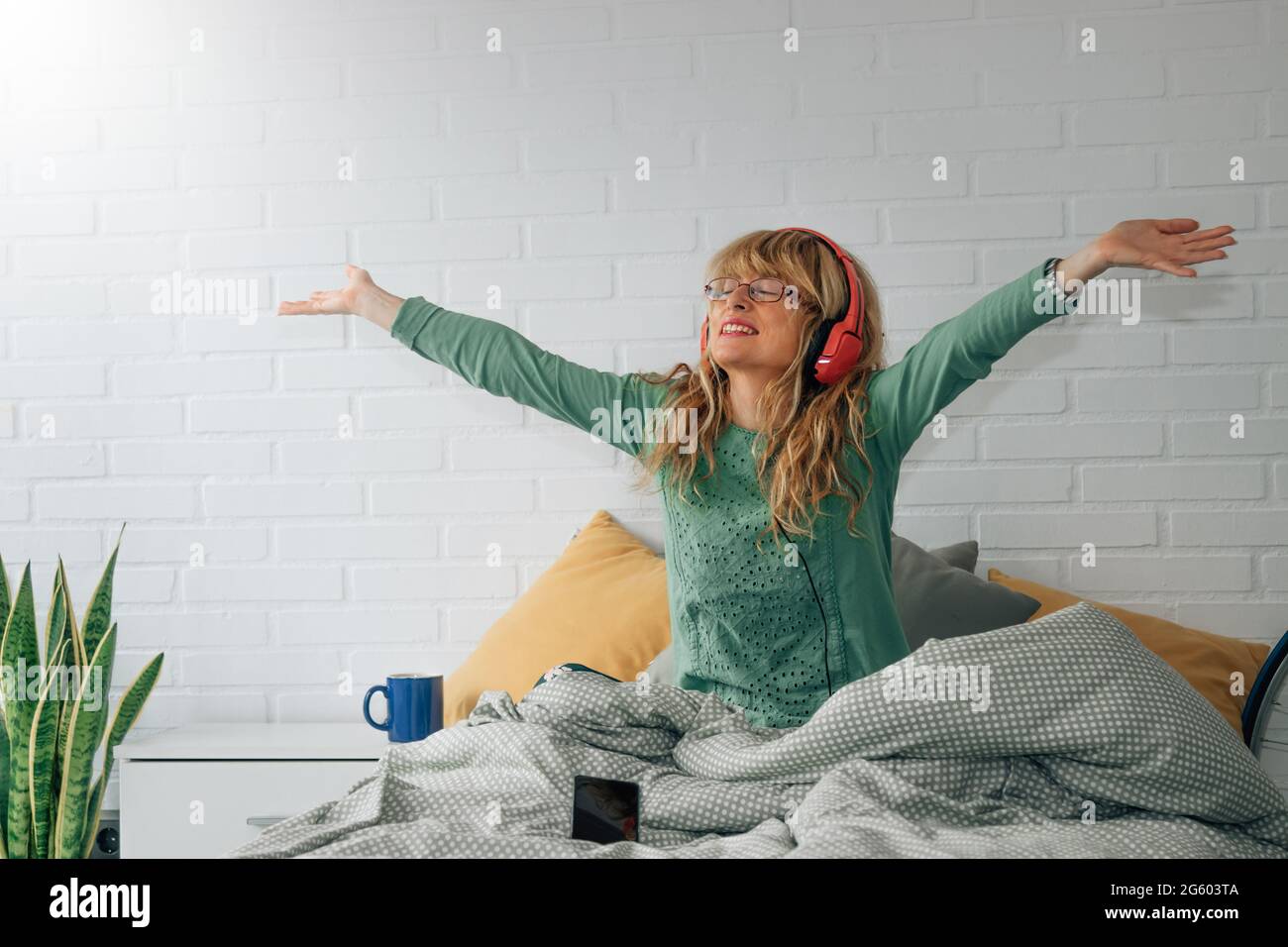 Woman dancing in bedroom morning hi-res stock photography and images ...