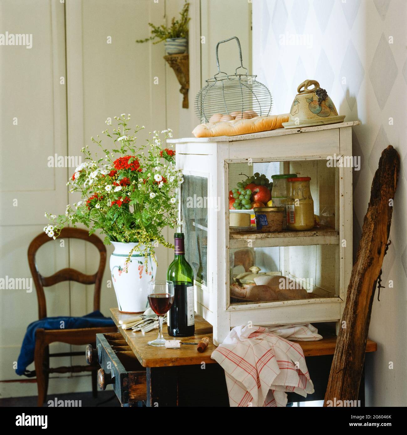 Food in display case in rustic kitchen Stock Photo - Alamy