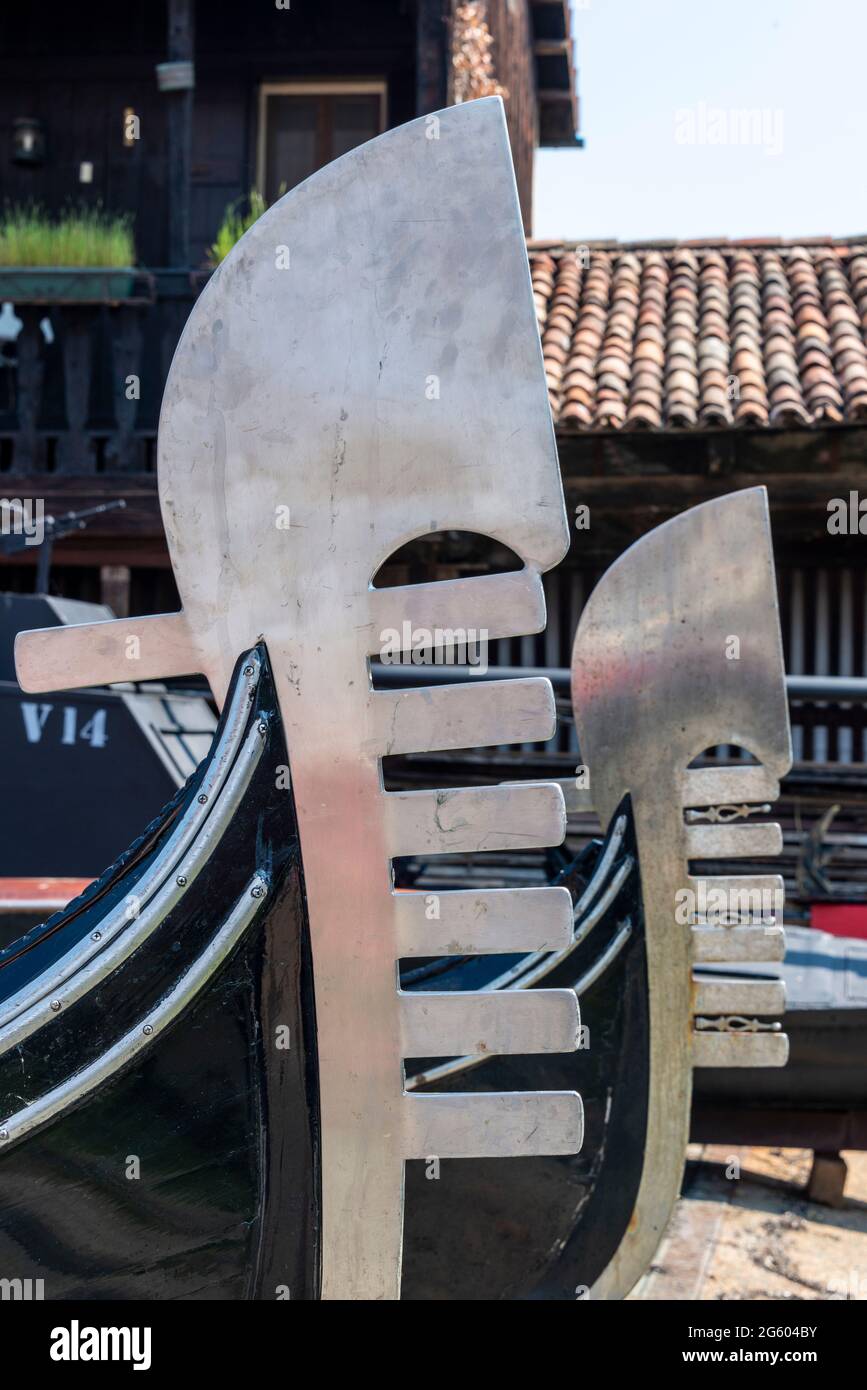 The shiny metal fork at the front of a gondola in Venice has a special ...