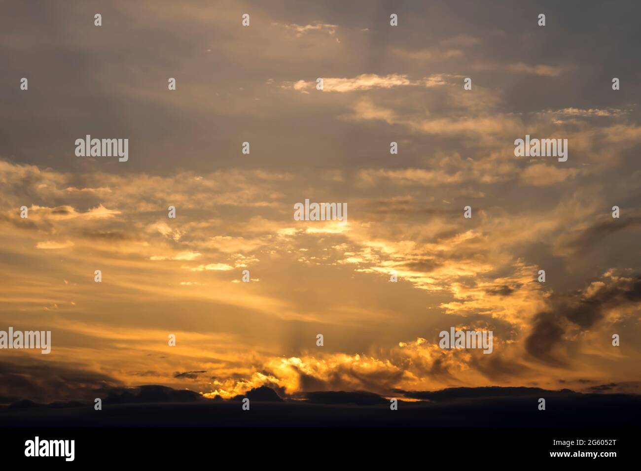 Photograph of the sunset sky as a background material Stock Photo - Alamy