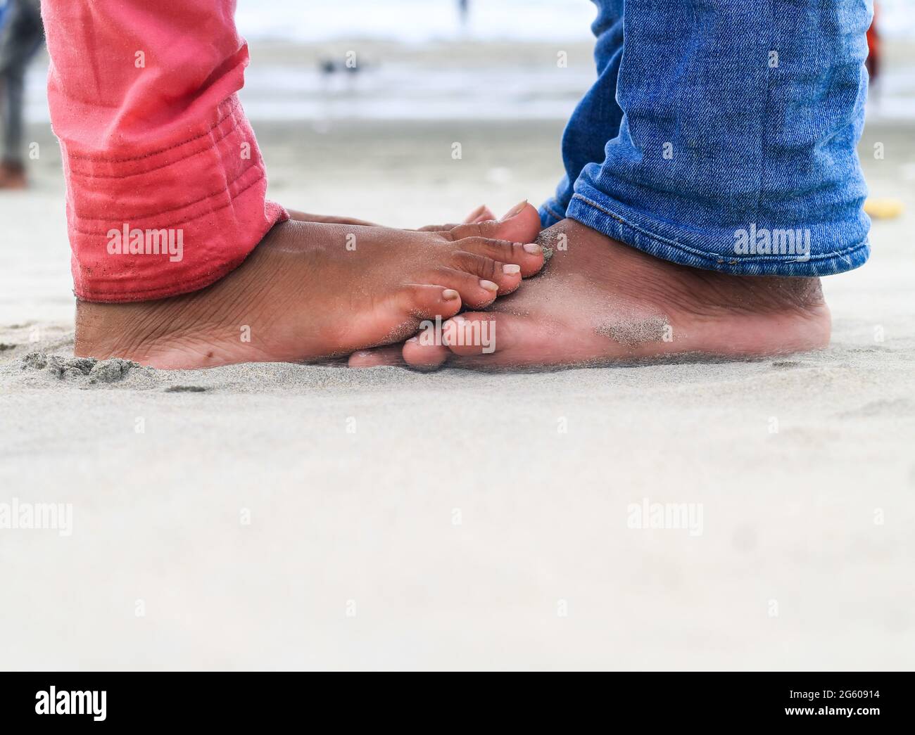 People Kissing On The Beach