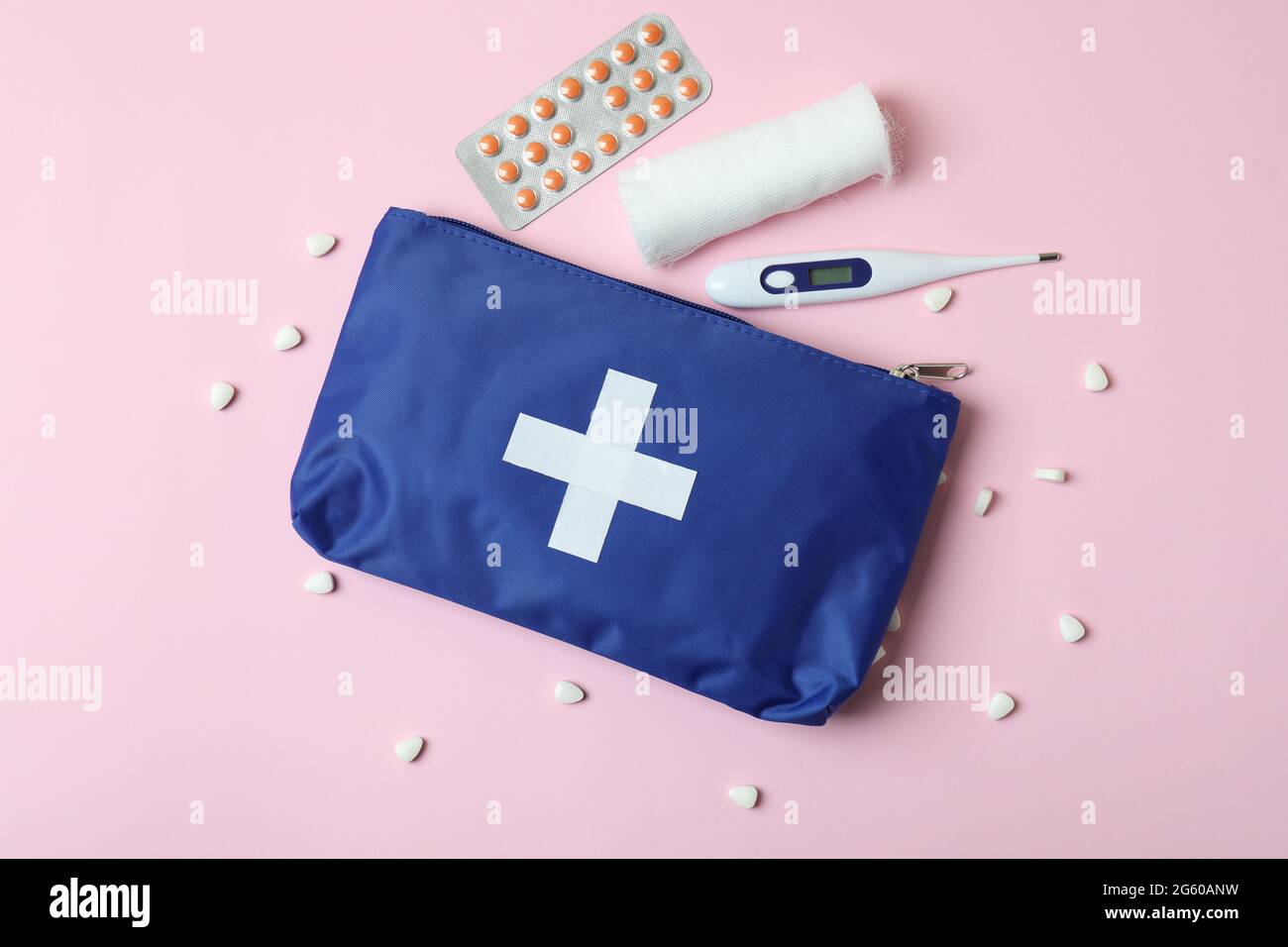 First aid medical kit on pink background Stock Photo - Alamy