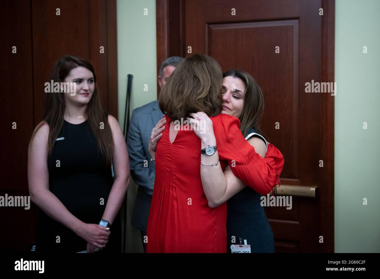 Rana Abbas Taylor, right, is comforted by United States Representative ...