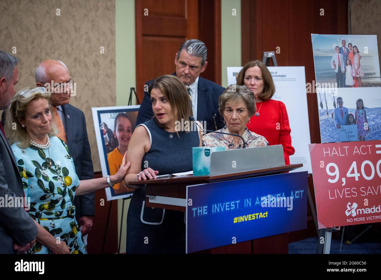Rana Abbas Taylor, center, is comforted by United States Representative ...