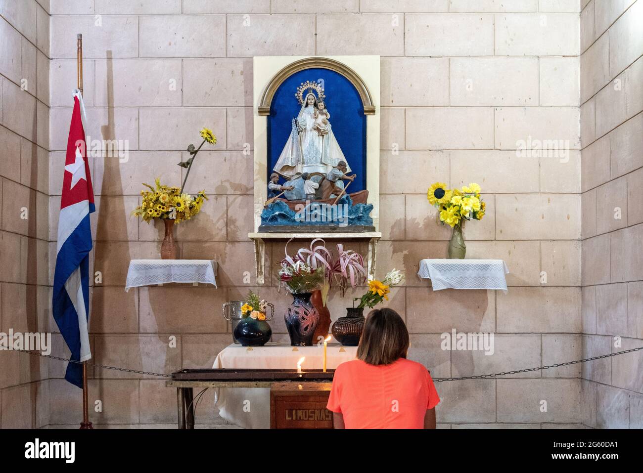 Cuban woman in a Catholic Church, Holguin, Cuba Stock Photo - Alamy