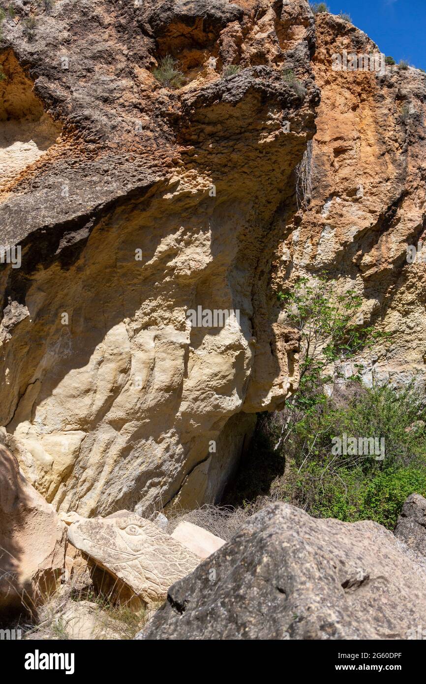 Stone in the shape of a serpent's head located at the entrance of a ...