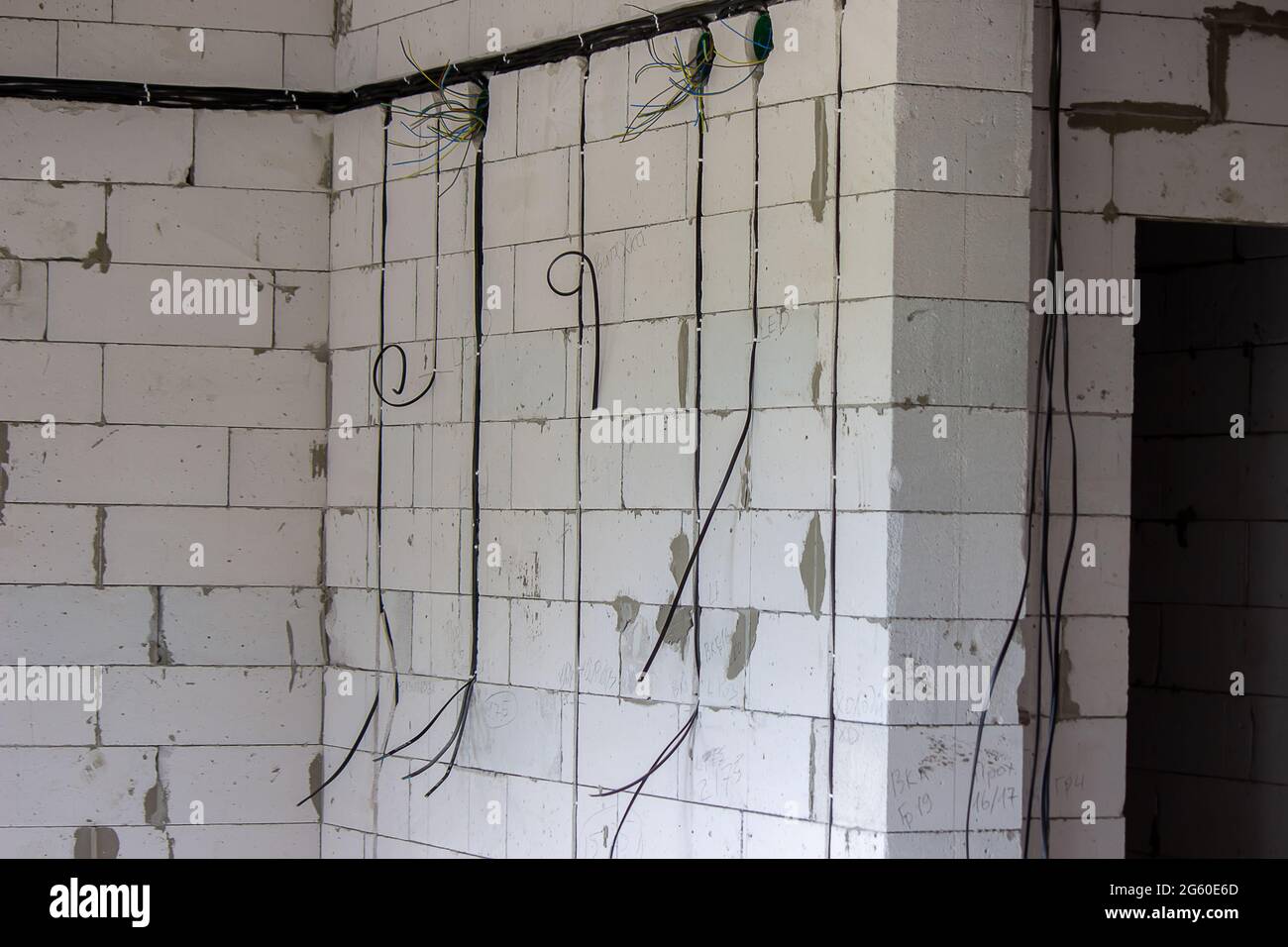 electrical wiring of the house, cable on the wall in the gate ...