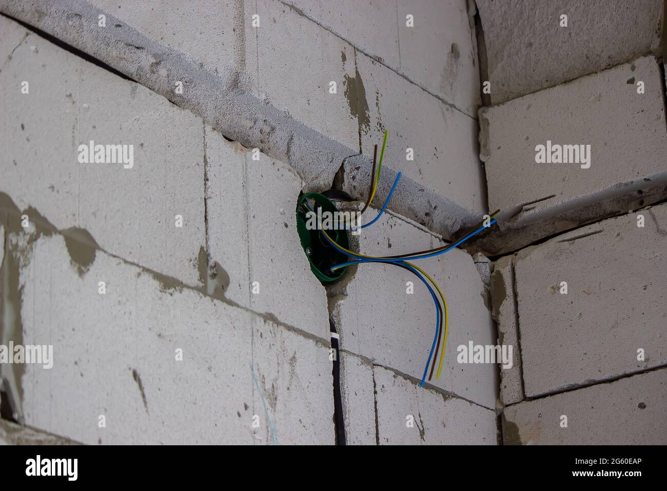 electrical wiring of the house, cable on the wall in the gate ...